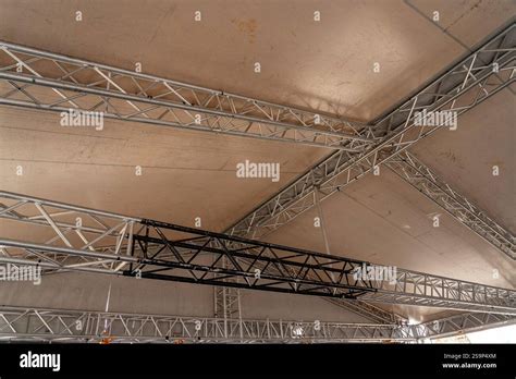View Of A Metal Truss Roof Showcasing Its Structural Design And