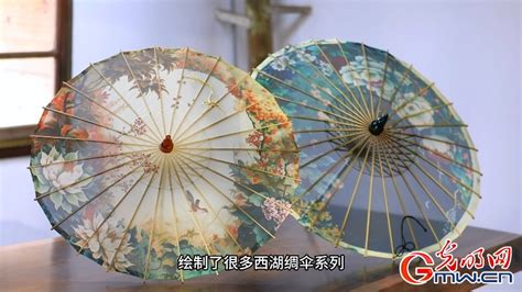 中国非遗年度人物｜aigc也能制作西湖绸伞？非遗跨界玩出“新花样” 光明网
