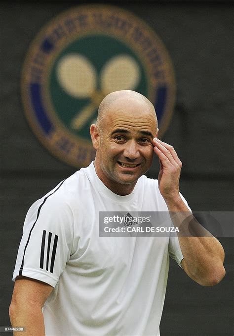 Andre Aggassi Reacts During His Exhibition Mixed Doubles Match News