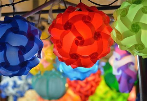 Premium Photo Close Up Of Multi Colored Decorations Hanging On String