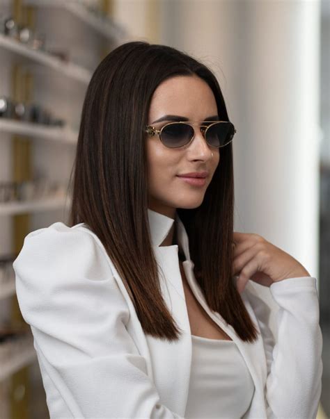 משקפי מיו מיו Miu Miu אופטיקה פריזמה