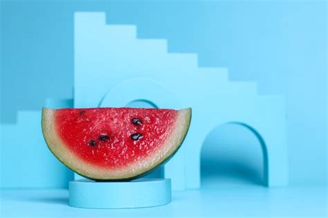Premium Photo Watermelon Slice In Blue Geometric Shape Background