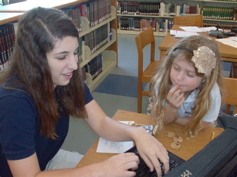 Words From The Center Tutors Work With First Graders