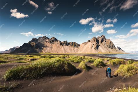 Premium Photo Scenery Of Vestrahorn Mountain And Grass Mound On Black