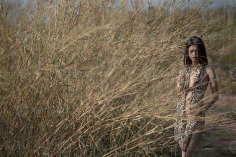 Sexy Asian Girl In Bikini In The Meadow And Grass Frond 23371444 Stock