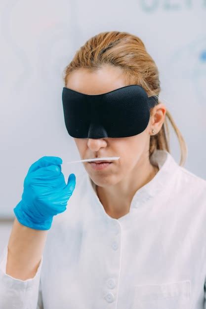 Premium Photo Olfaction Female Scientist Examining Smells With Mask