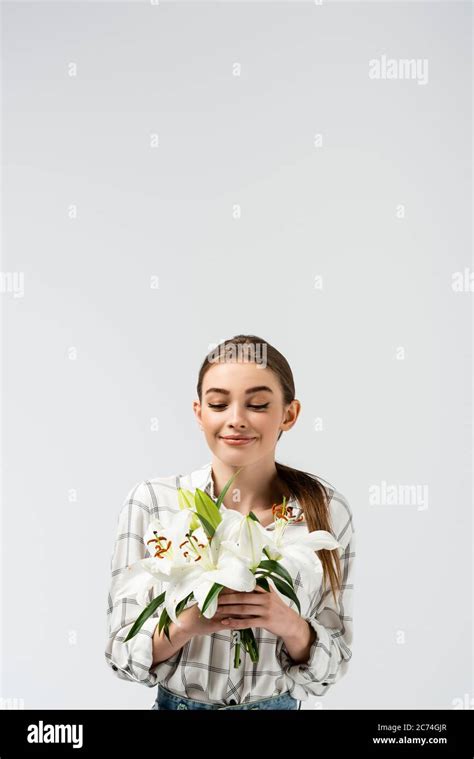 Smiling Attractive Girl Posing Like Puppet With Flowers Isolated On