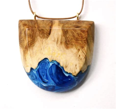 Resin And Wood Jewelry By Britta Boeckmann Encapsulates Crashing Ocean Waves — Colossal