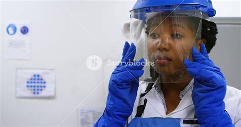 Scientist Wearing Lab Suit In Laboratory 4k Moment Stock Image Sbi