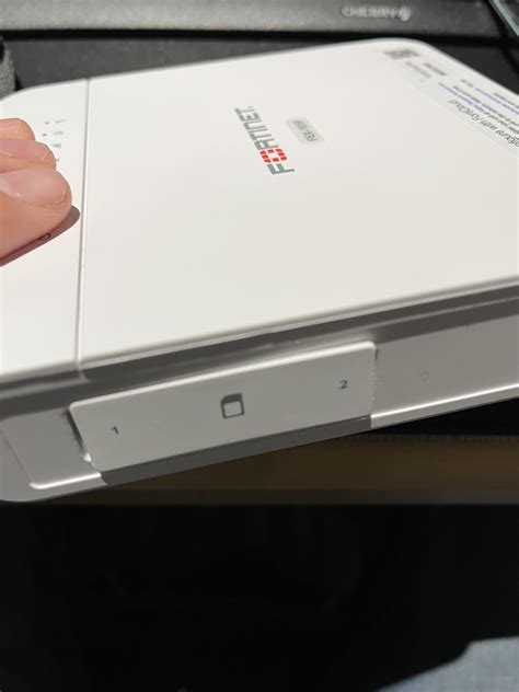 How Do I Get The Sim Cover Off Fex 101f Am R Fortinet