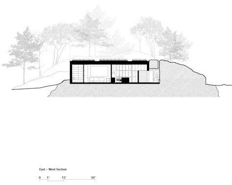 Concrete House By Olson Kundig Architects Cuts Into A Rocky Outcrop