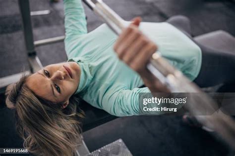Woman Bench Pressing Photos And Premium High Res Pictures Getty Images