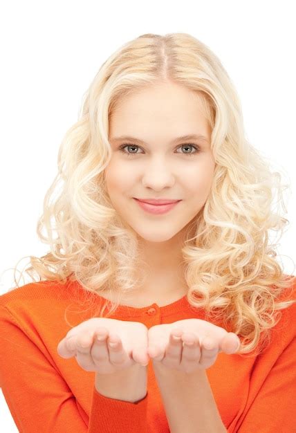 Premium Photo Beautiful Woman Showing Something On The Palm Of Her Hand