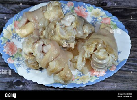Arabic Egyptian Cuisine Of Kawareh Trotters With Its Traditional Soup