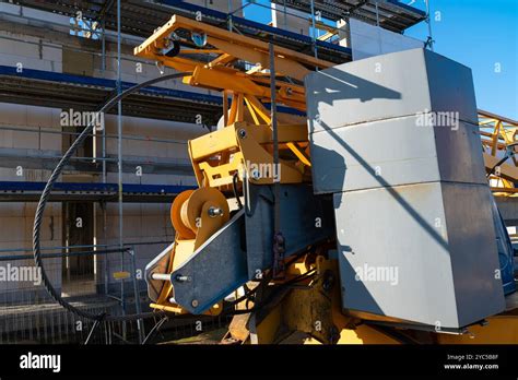 Rear Of Folded Construction Crane The Site Is Surrounded By Rear Of Folded Construction Crane The Site Is Surrounded By