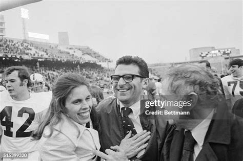 Penn State Coach Joe Paterno Is Congratulated By His Wife Suzanne