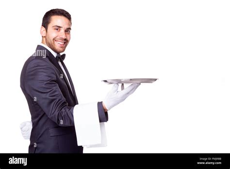 Handsome Waiter Holding An Empty Silver Tray Isolated On White