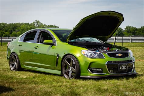 Green Chevrolet Ss Sedan With Hood Open