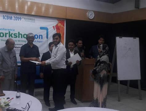 Receiving Certificate From Professor Dr Saleh Uddin Ahmed Ex