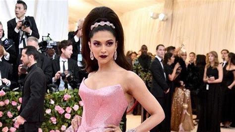 Watch Deepika Padukone Trips On Her Dress While Sipping Wine At Met