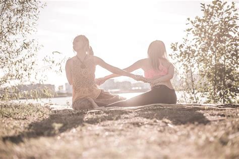 Massage Trainer Performs A Relaxing Massage On The Forest Ground Stock