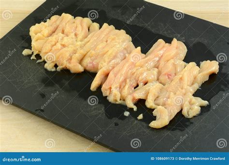 Raw Strips Of Chicken Breast Meat Stock Image Image Of Black