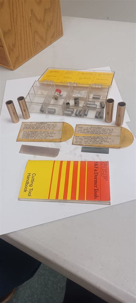 Assortment Of Reamer Bushing Stones Guides Snap Ring And Cutting Handbook