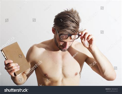 Young Naked Man Reading Looking Camera ภาพสตอก Shutterstock
