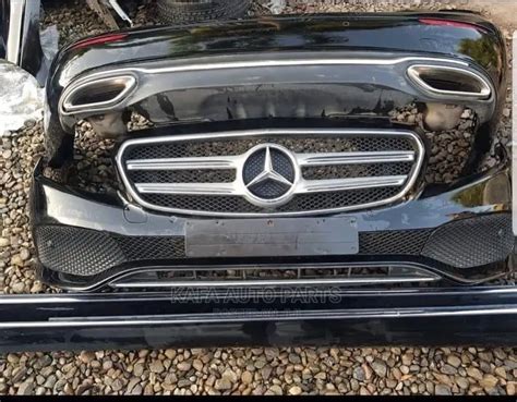 Benz E250 Front And Back Bumper Sidepanels Grills Fenders In Abossey Okai Vehicle Parts