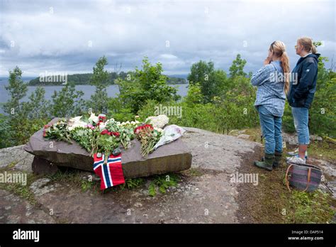Girls Stand Near A Makeshift Memorial For The Victims Of The Massacre On Utoya Island