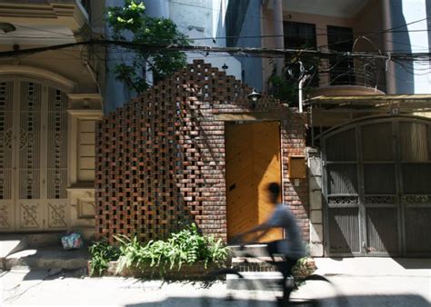 Perforated Brick Gable Screens Courtyard In Front Of Compact Hanoi House