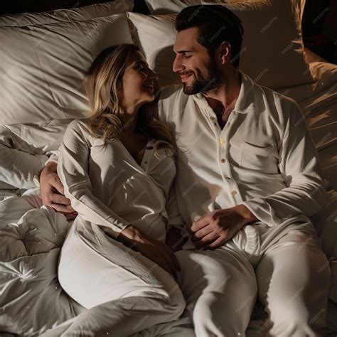 Premium Photo Beautiful Romantic Couple Relaxing On The Bed Before