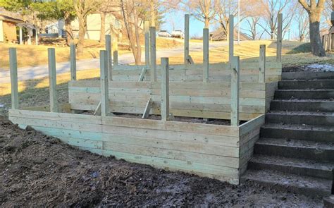 Wooden Retaining Wall With Slope How To Build A Wood Retaining Wall On