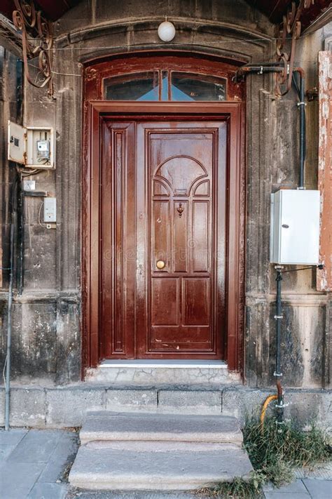 Old Classical Stone House With Rustic Brown Carved Vintage Wooden Door Door Textures And