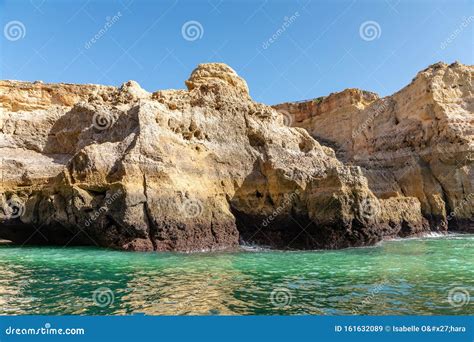 Beautiful Landscape Of Algarve Portugal Coast With Sandstone Cliffs