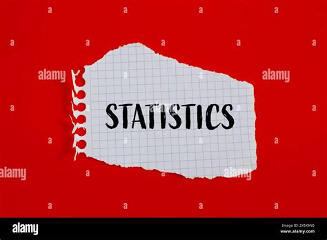 statistics word written on ripped white paper with red background