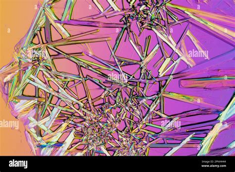 Epsom Salts Crystals Photographed On A Microscope Slide Using Cross Ploarised Light And A Wave