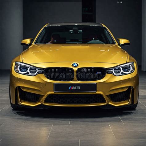 Gleaming Golden Bmw M3 Front View In Showroom Setting Stock