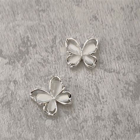 قیمت و خرید استیکر برجسته راسا طرح پروانه نگین دار مدل Rss10 بسته 4 عددی