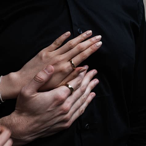 The Bond Womens Gold 4mm Tungsten Gloss Finish Curved Ring