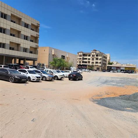 للبيع ارض تجارية في عجمان الروضة 2 ثاني قطعه من شارع شيخ عمار