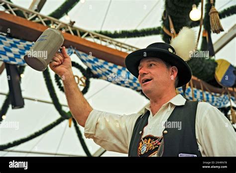 Bandleader Of A Brass Band Man In Traditional Bavarian Traditional