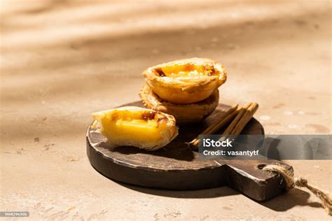 Portuguese Egg Custard Tart Pastry Dusted With Cinnamon Pasteis De