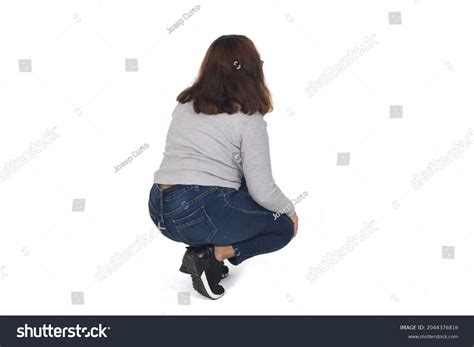 Woman Squatting From Behind Over 325 Royalty Free Licensable Stock