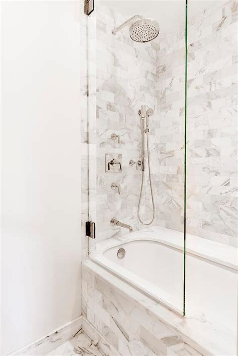 Marble Subway Tiled Tub With Glass Shower Partition Transitional