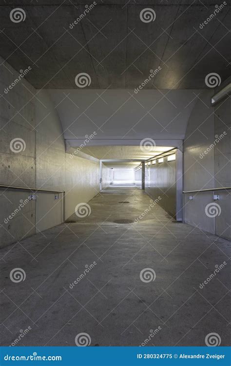 Concrete Pedestrian Underpass Passing Under The Train Station In