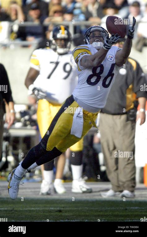 Pittsburgh Steelers Wide Receiver Hines Ward Stretches As He Tries In Vain To Catch A Pass As