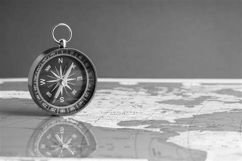 Premium Photo Close Up Of Navigational Compass On Map