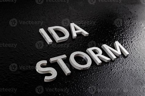 The Words Ida Storm Laid With Silver Metal Letters Over Black Surface