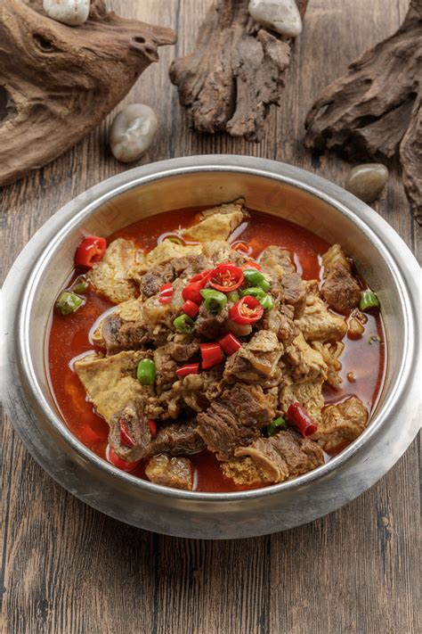 红汤锅仔豆腐炖牛腱图片 包图网企业站